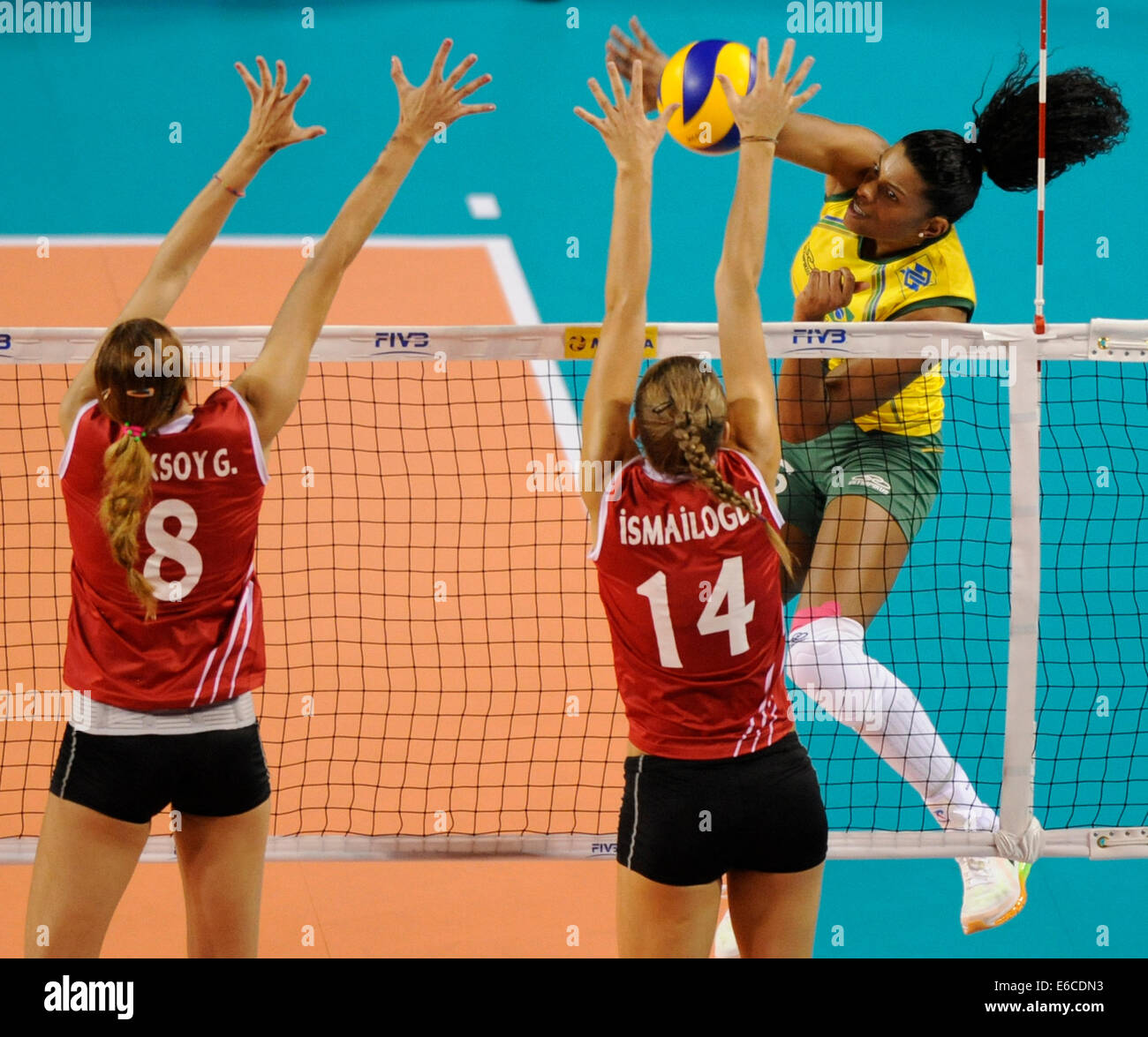 Tokyo, Japan. 20th Aug, 2014. Fernanda Rodrigues (R) of Brazil spikes ...