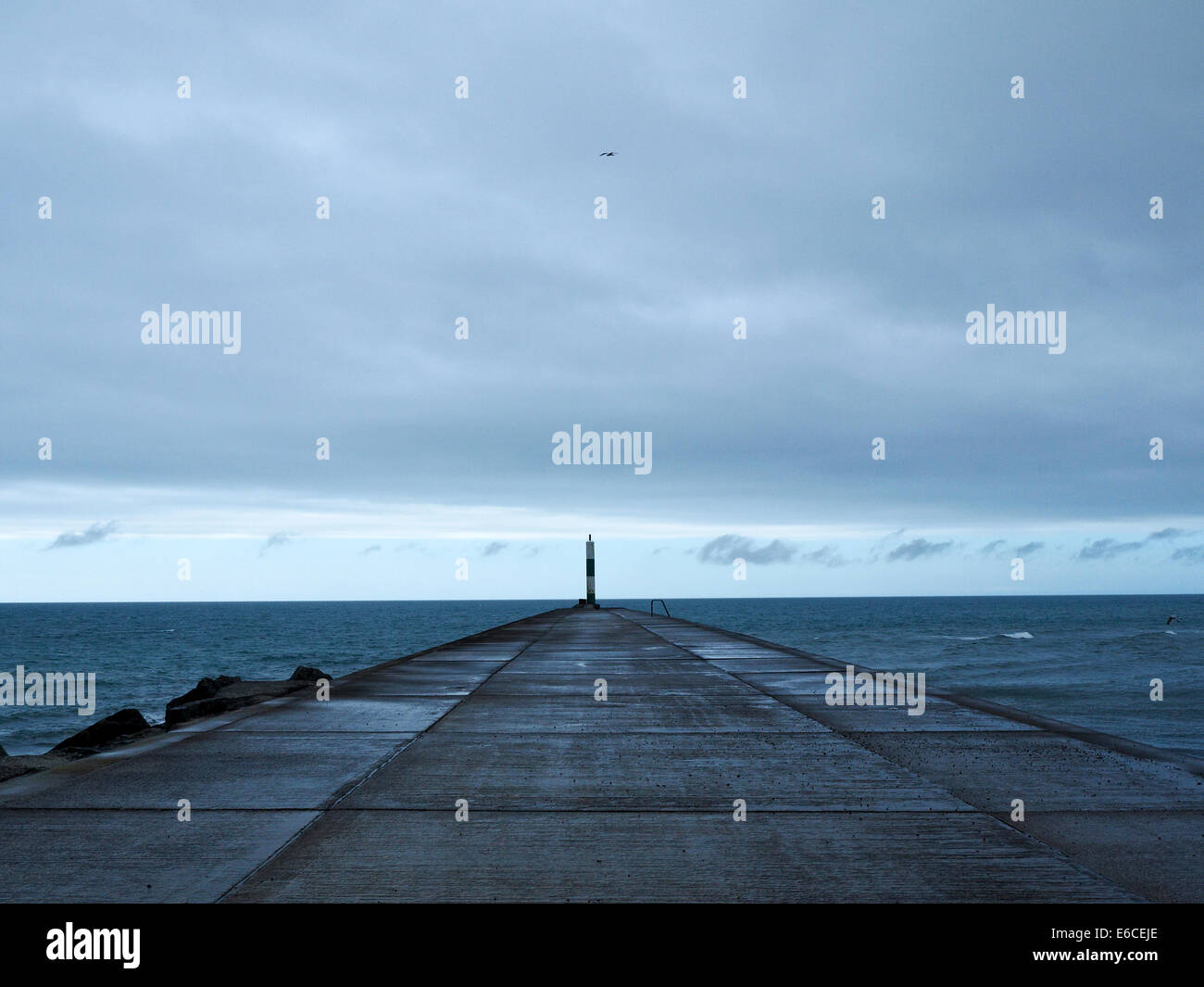 Stone jetty in Aberystwyth Wales UK Stock Photo - Alamy