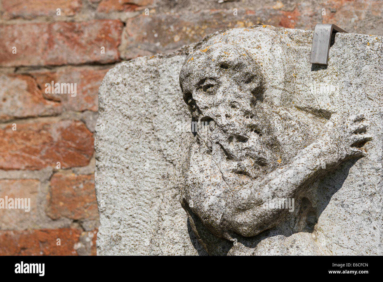 Detail Medieval relief sculpture of Christ Bearing the Cross at the ...