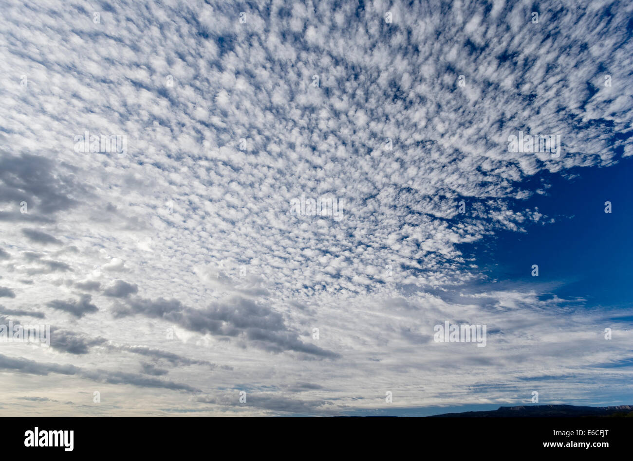 Utah. USA. Cirrus floccus, cirrostratus, and cumulus humilis clouds ...