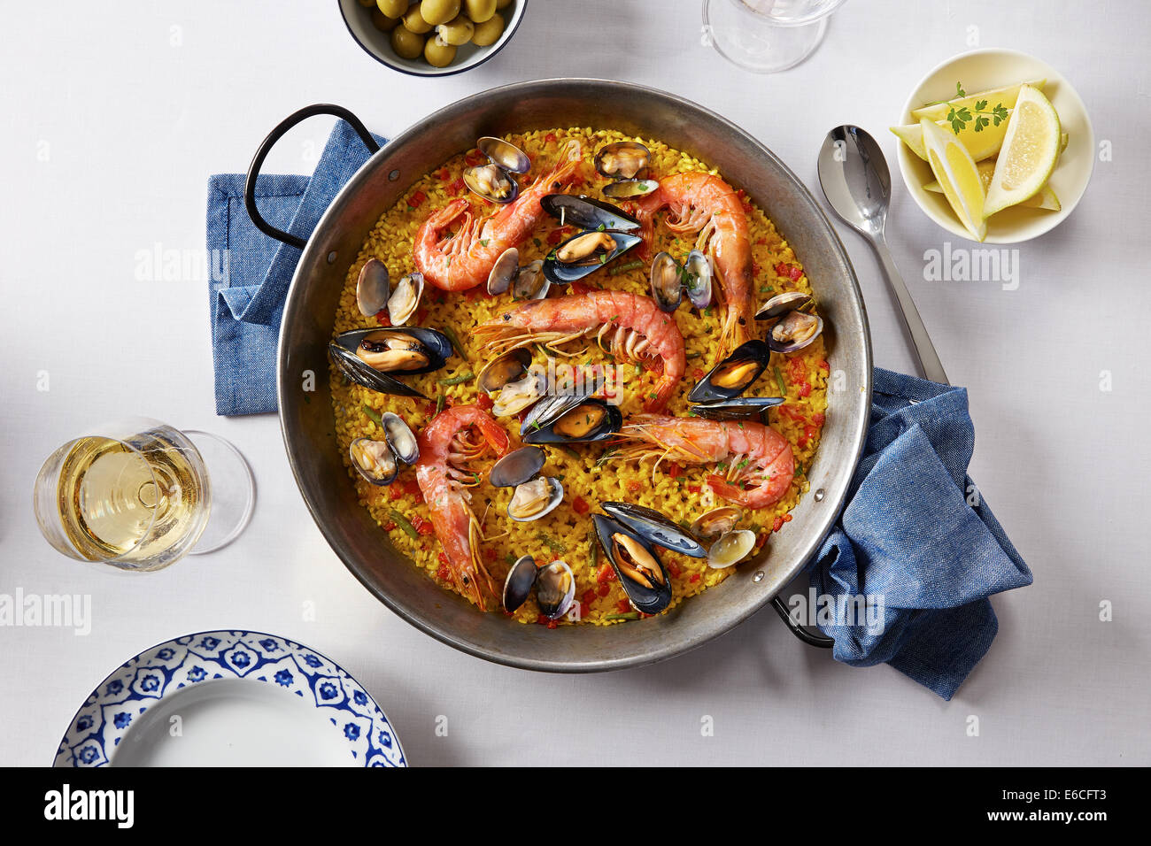 Typical spanish seafood paella in traditional pan Stock Photo - Alamy