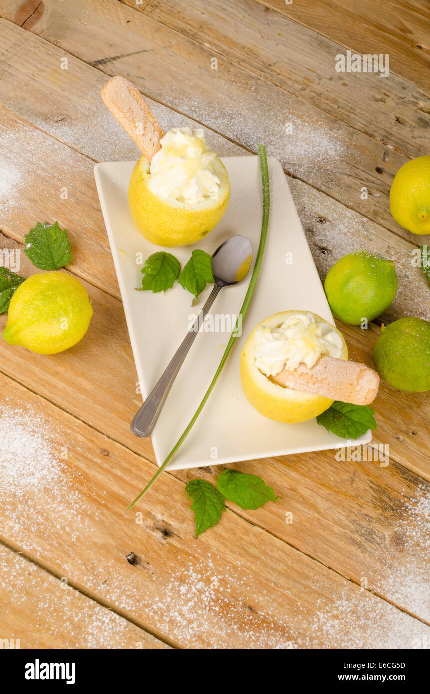 Homemade lemon sorbed served inside an empty lemon half Stock Photo - Alamy