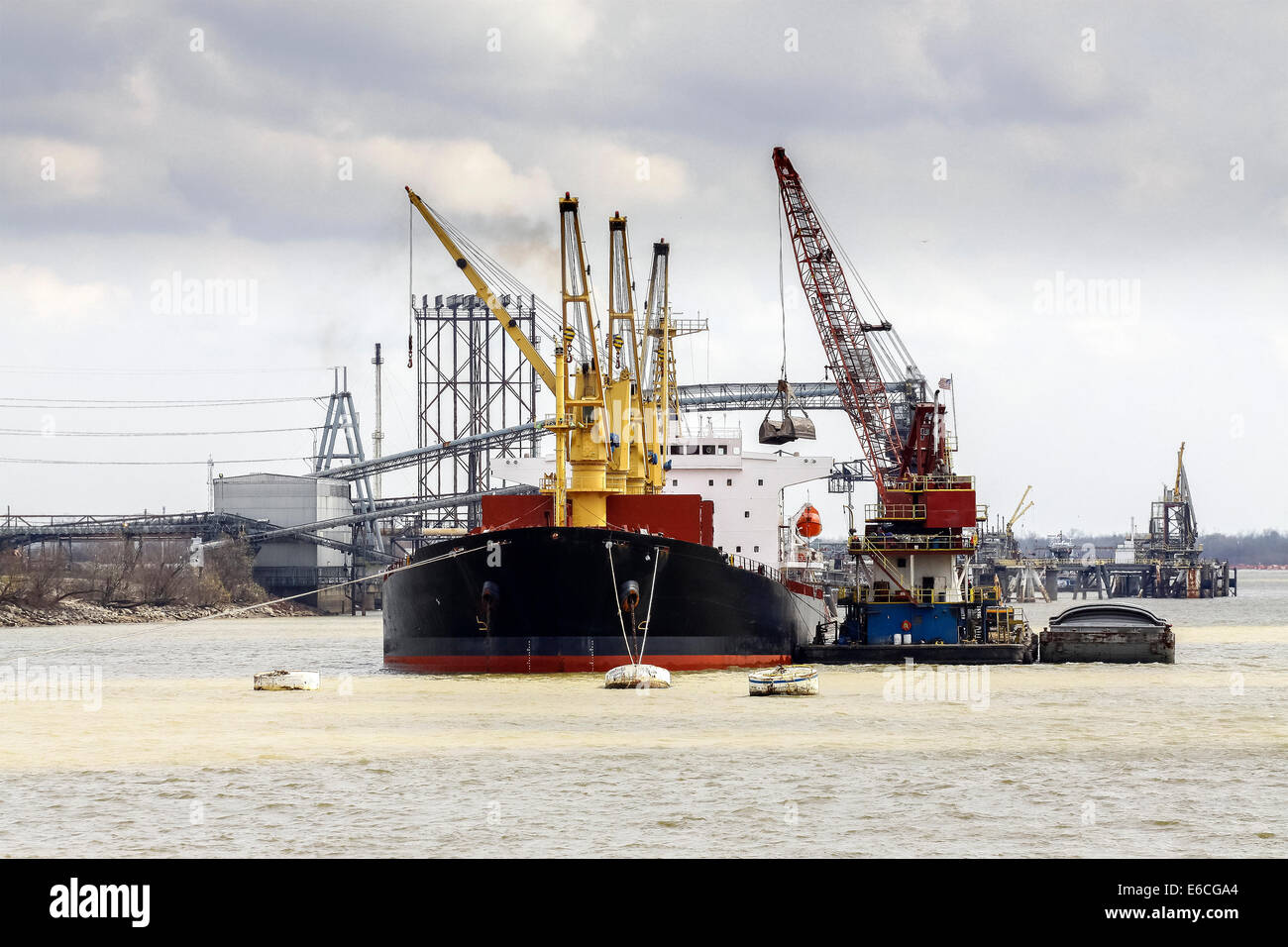 Cargo ship loading in the port Stock Photo - Alamy