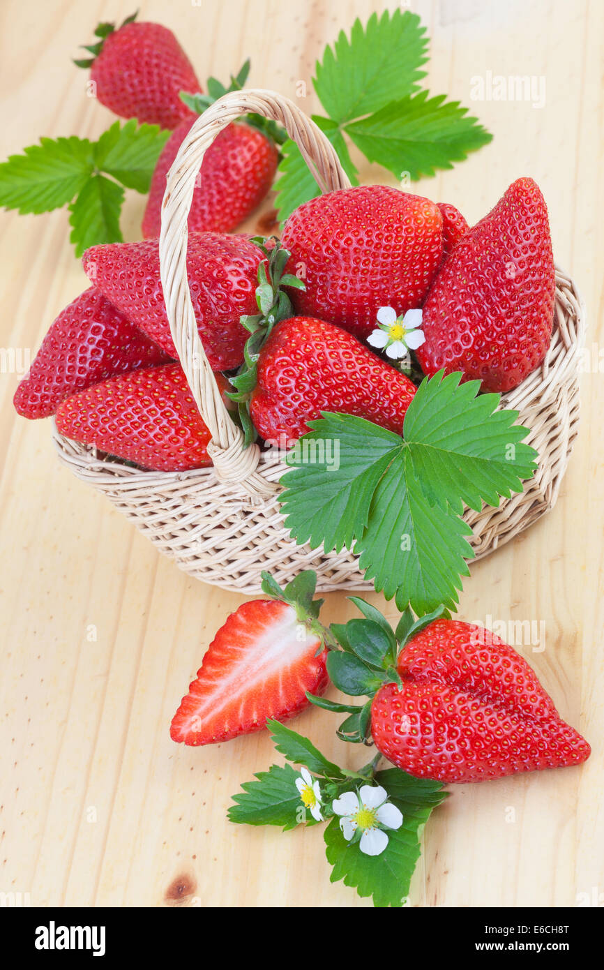 Many strawberries in basket hi-res stock photography and images - Alamy