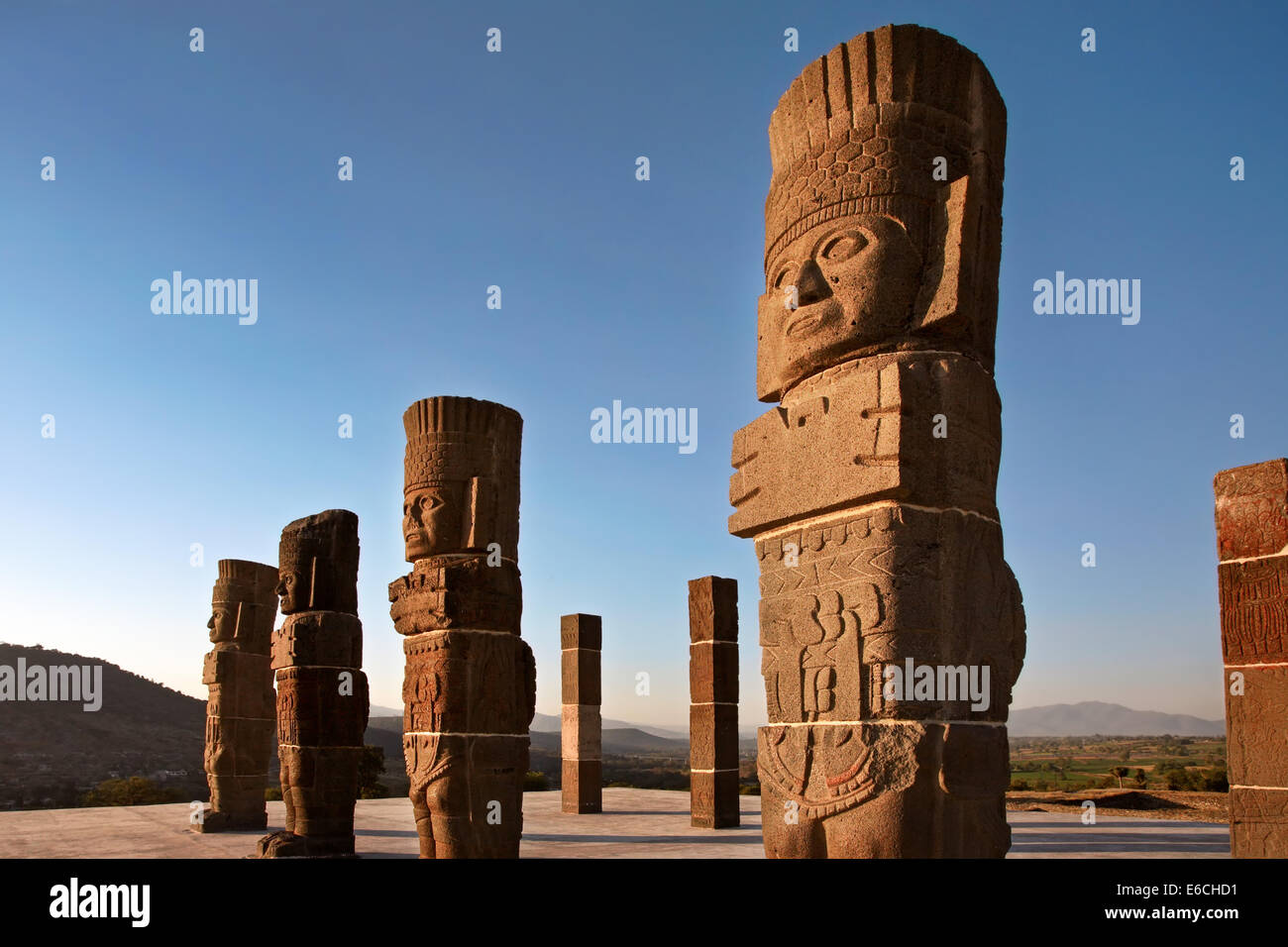 The large stone sculptures of the Atlantes stand atop the main pyramid ...