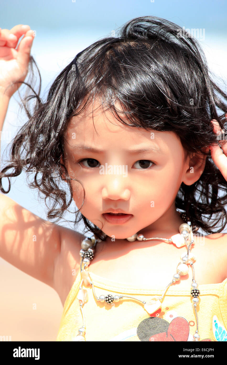 Portrait of the beautiful small Asian girl. Indonesia Stock Photo - Alamy