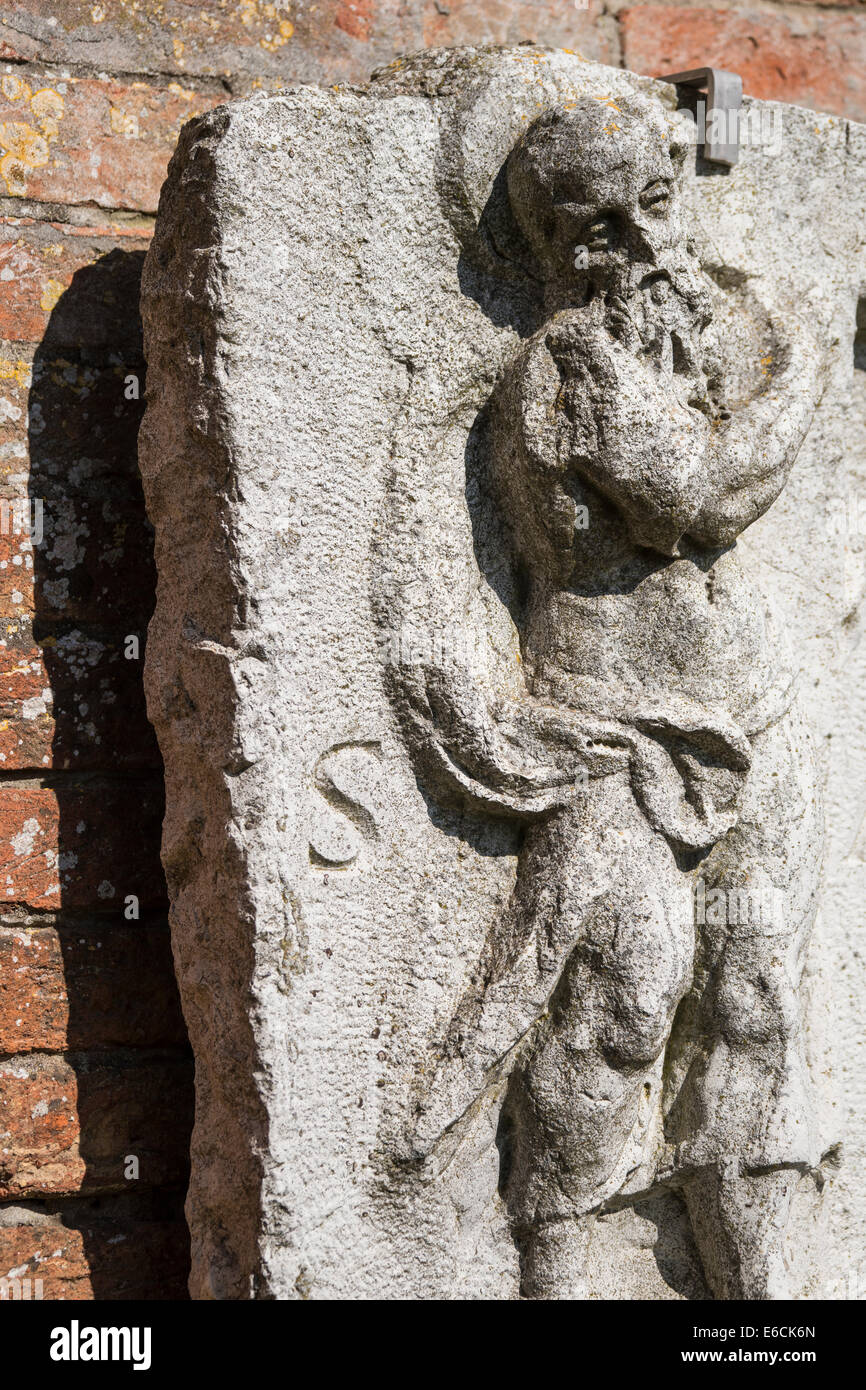 Medieval relief sculpture of a saint at the Torcello Museum on the ...