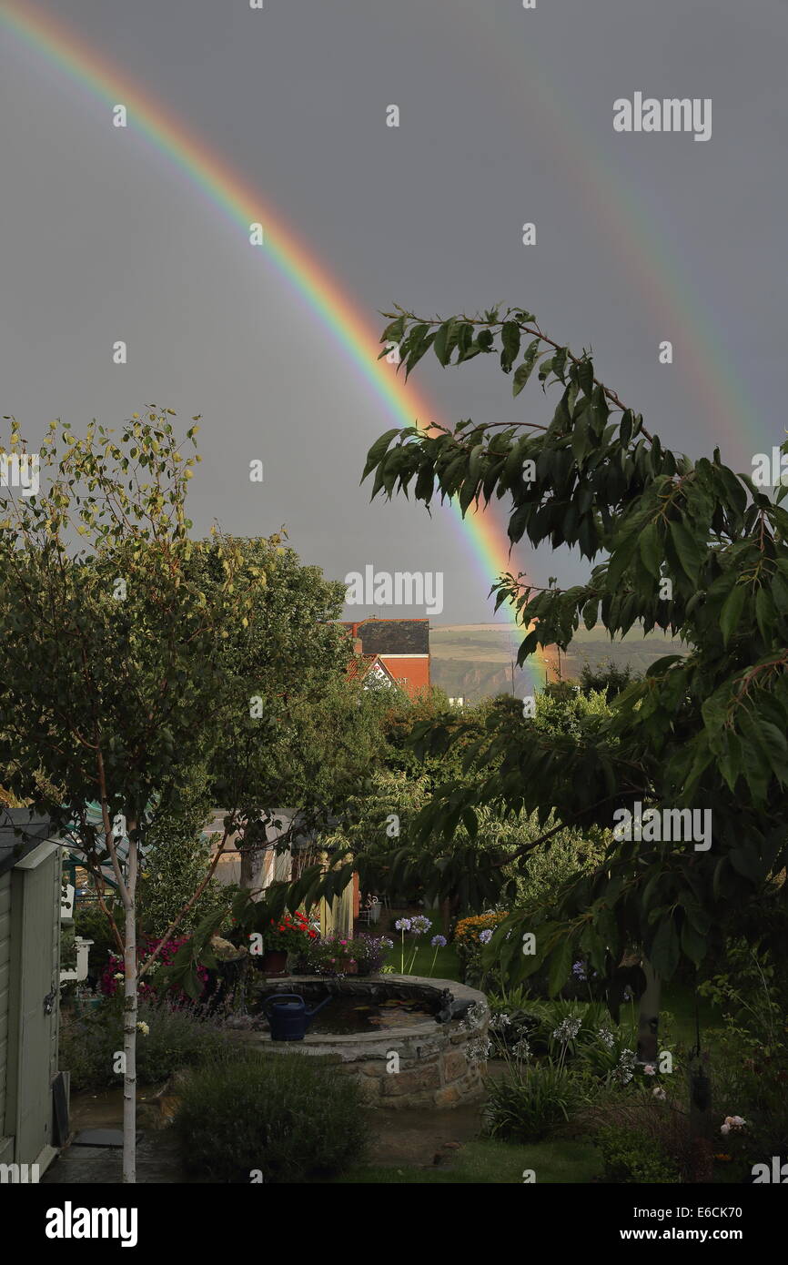Double Rainbow over Garden Stock Photo - Alamy