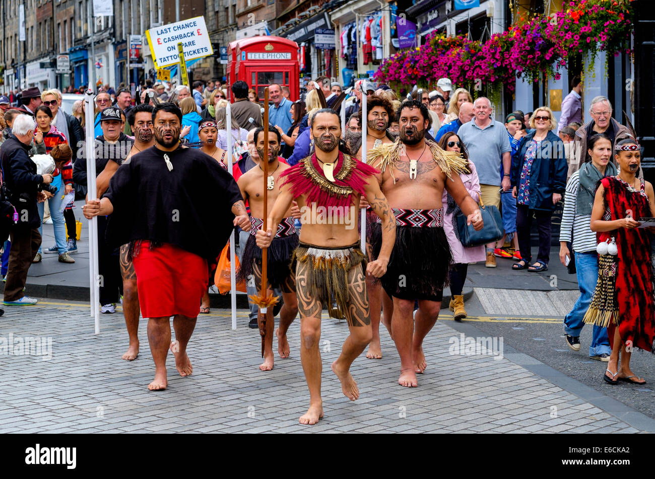 Fringe performers entertain and promote their show in the High Street ...