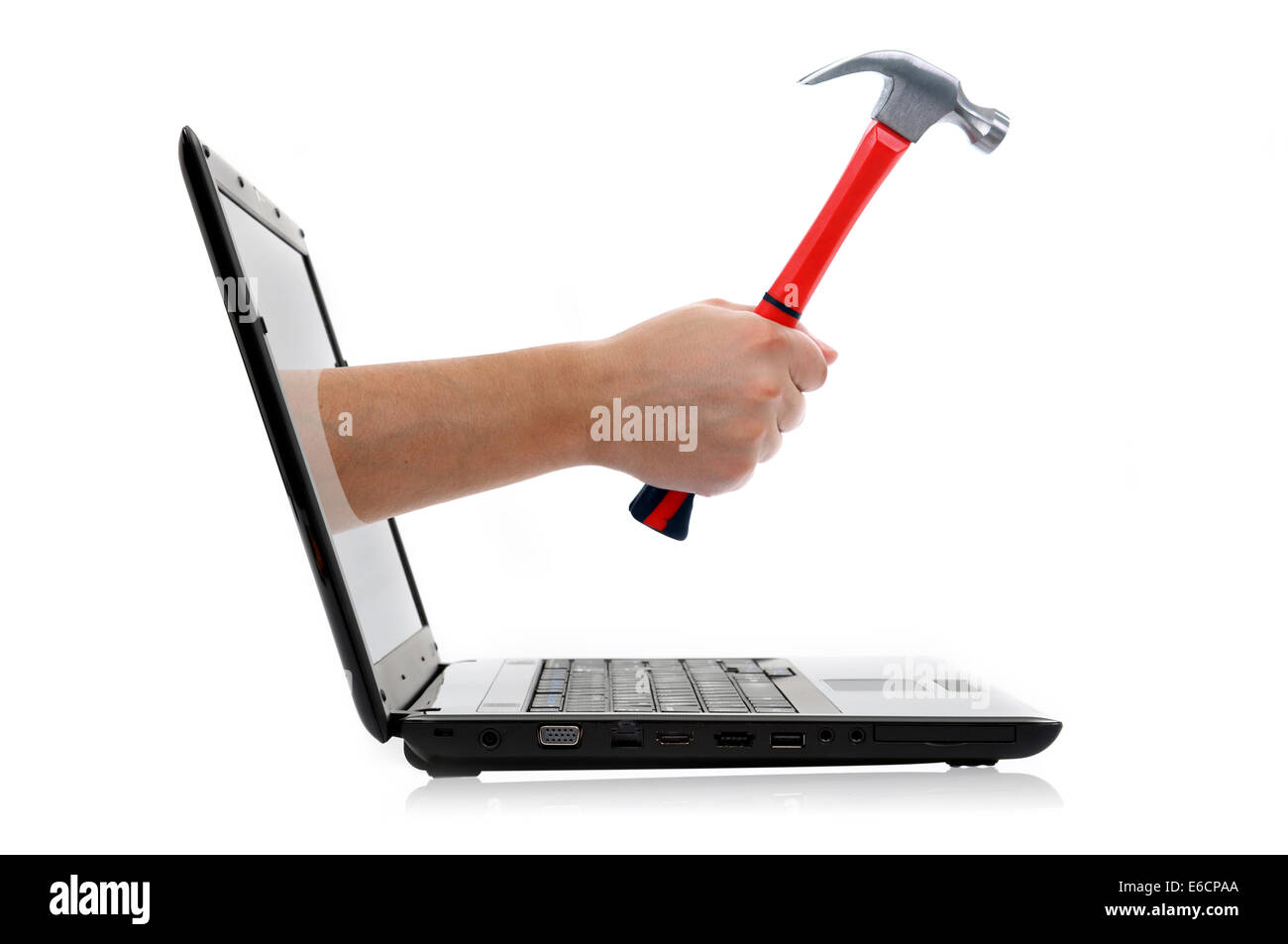 hand with hammer comes from laptop screen on the white background Stock ...