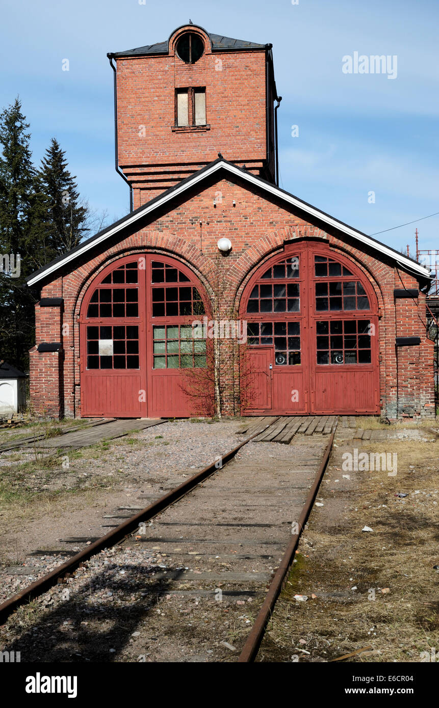 old brick building locomotive depot with arched windows Stock Photo - Alamy
