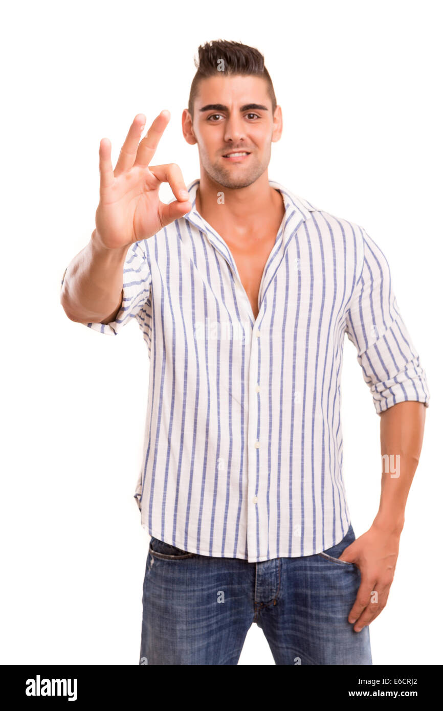 Handsome young man signaling ok, isolated over a white background Stock ...
