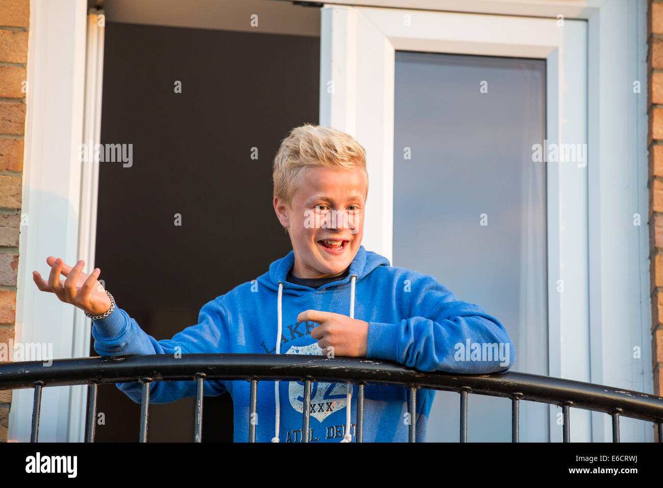 Boy on a balcony hi-res stock photography and images - Alamy