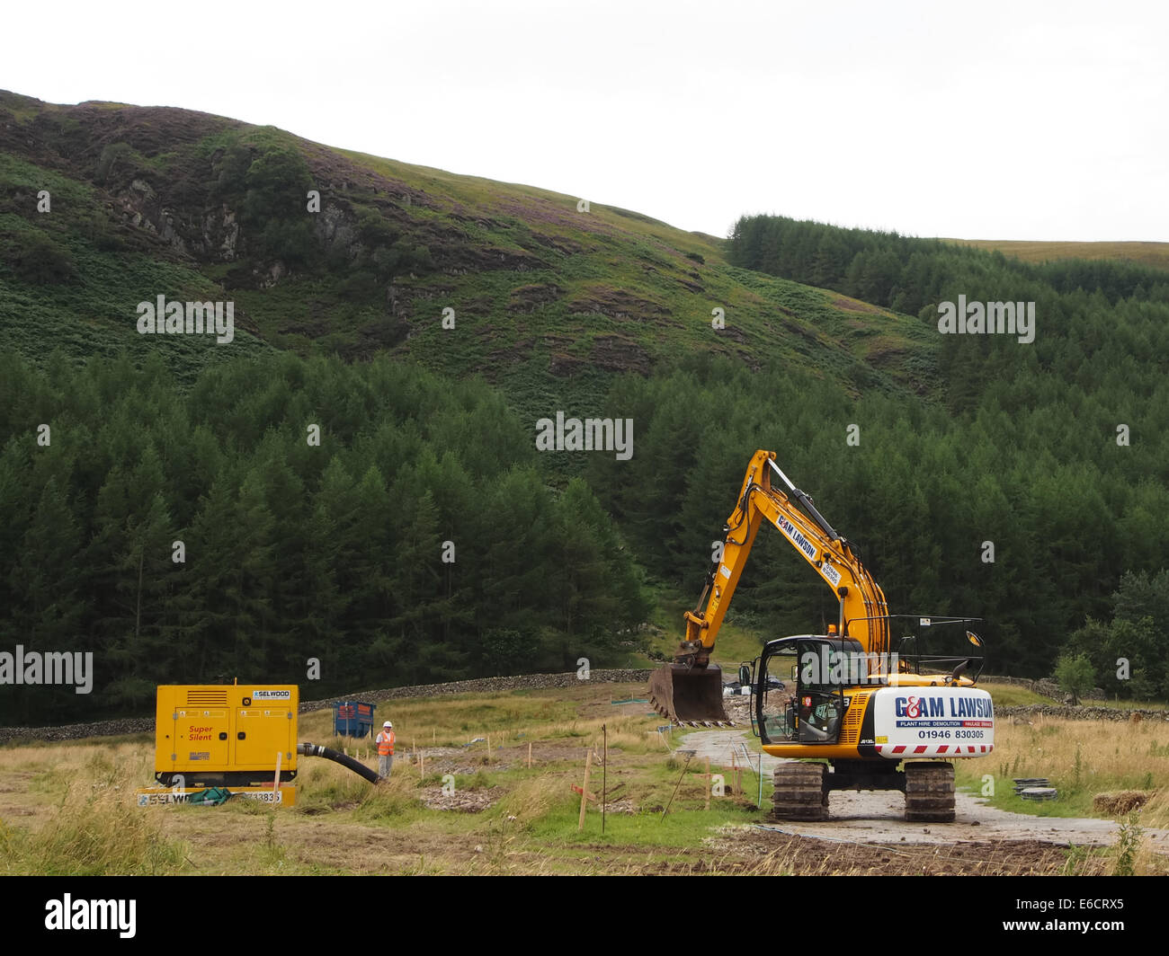 JCB digging drainage in the Rural area close to Ennerdale Water ...