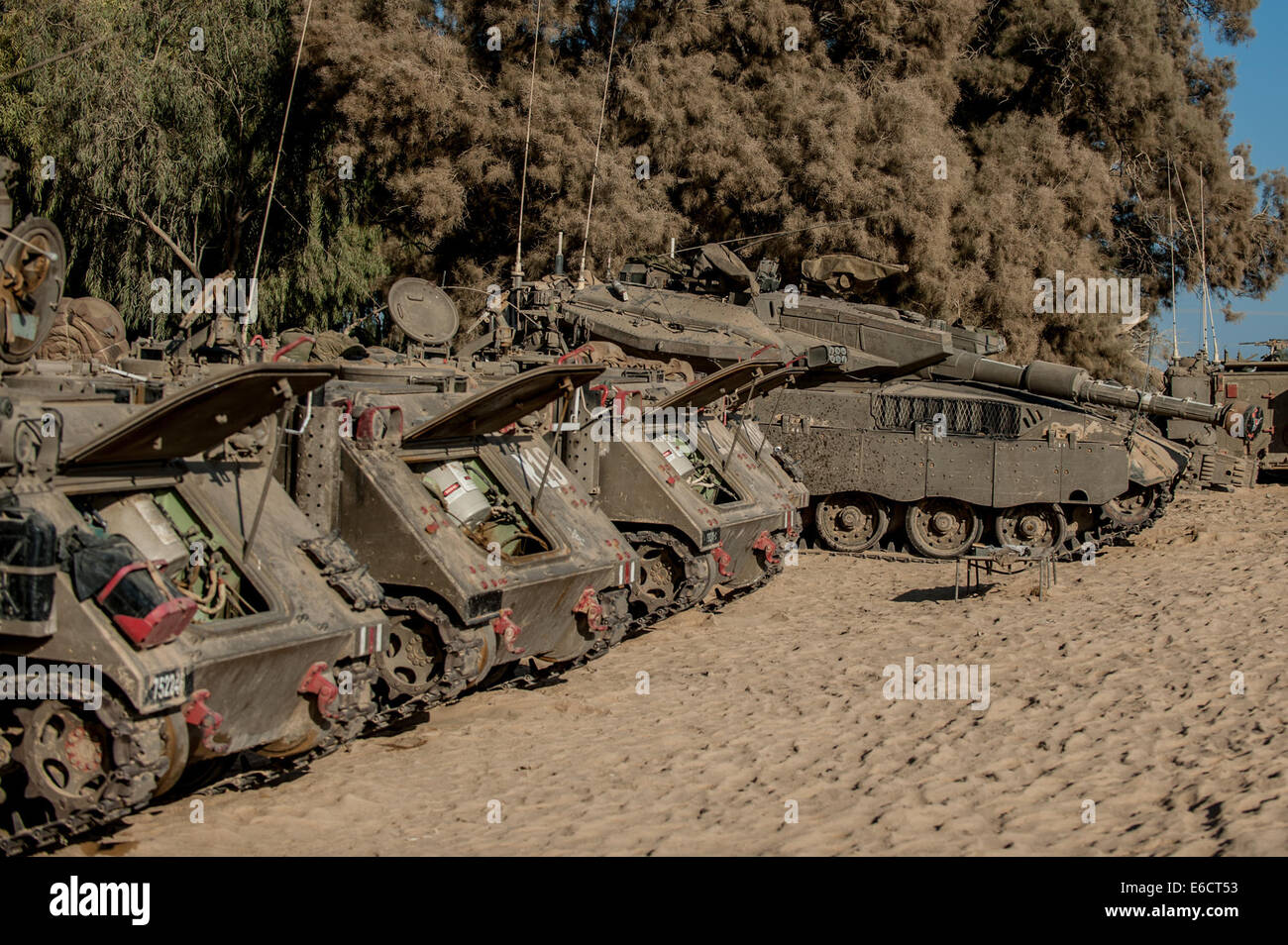 Gaza Border. 20th Aug, 2014. An Israeli Merkava tank and APCs are seen ...
