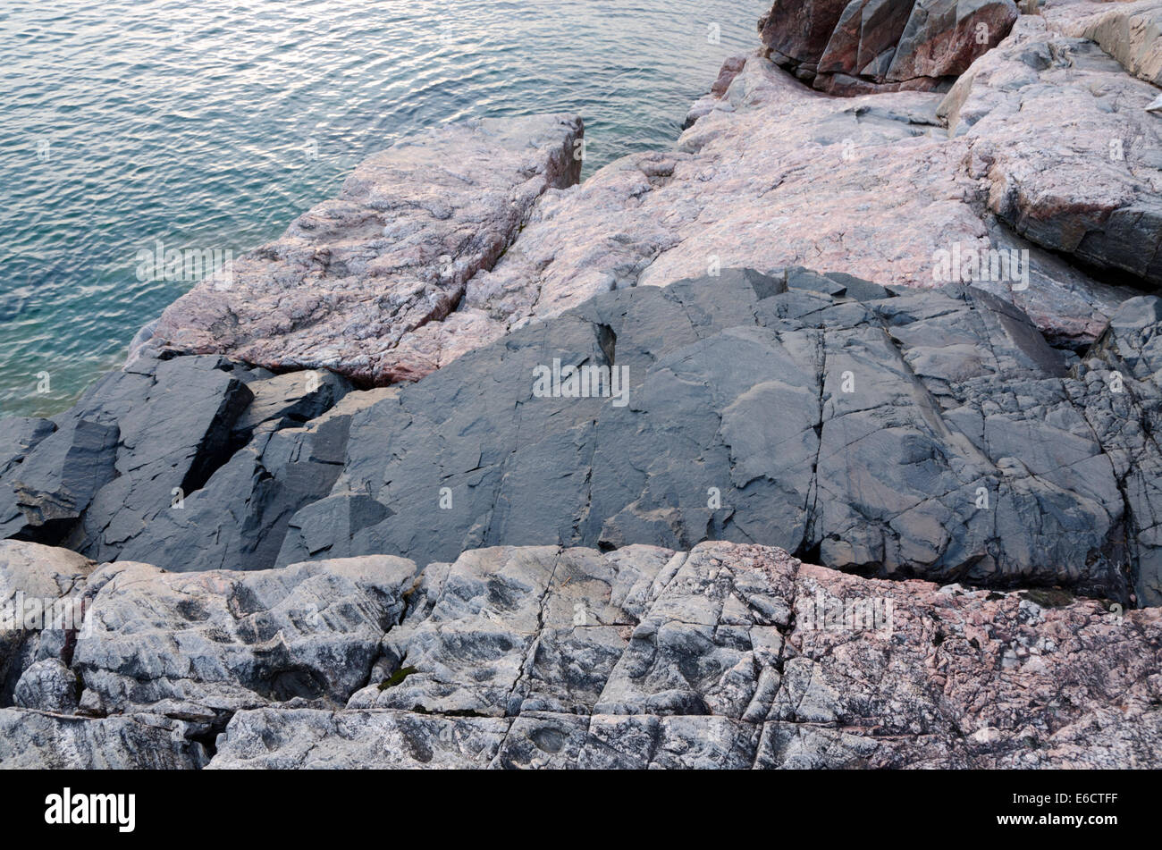 An intrusive black dike on shore Superior Lake Stock Photo - Alamy