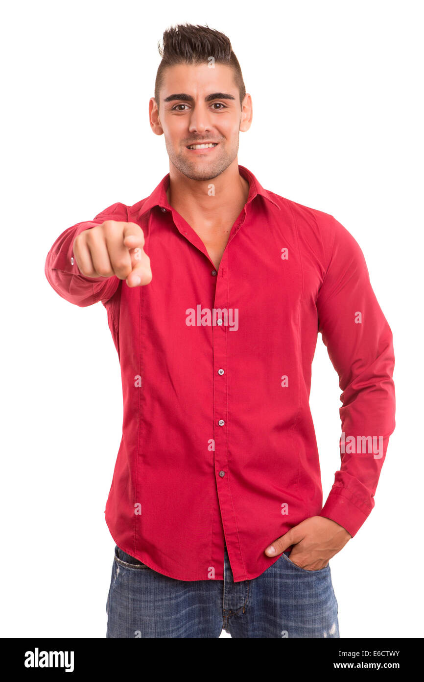 Handsome young man pointing at you, isolated over white background ...