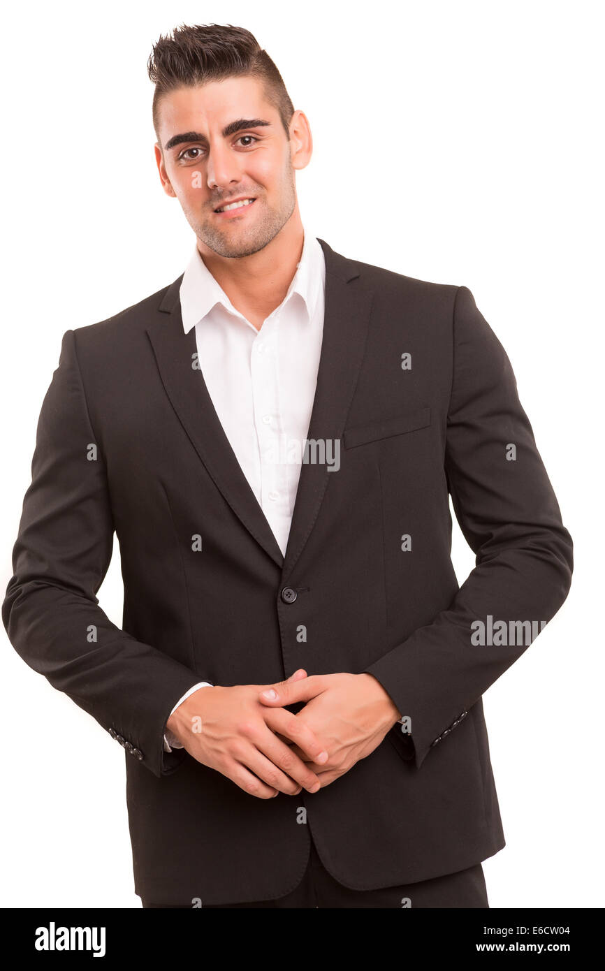 Handsome young business man posing isolated over white background Stock ...
