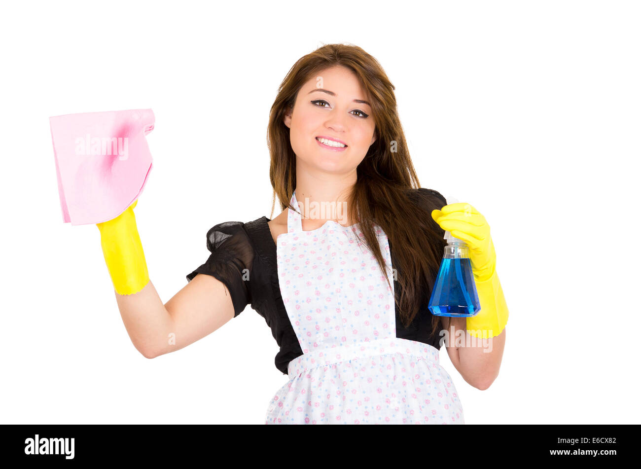Beautiful young housewife cleaning Stock Photo - Alamy