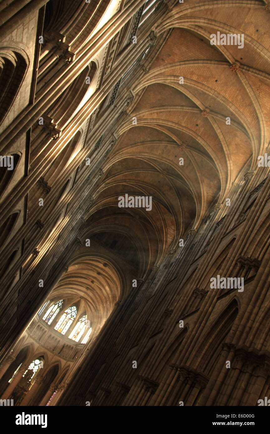 Roman Catholic Gothic cathedral of Rouen interior view from nave ...