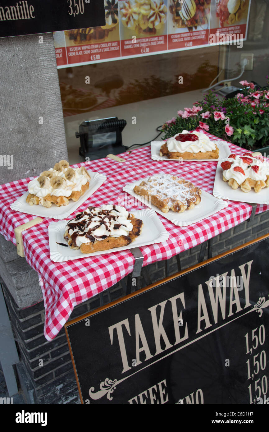 Samples of the Belgian waffle toppings on display outside a waffle shop ...