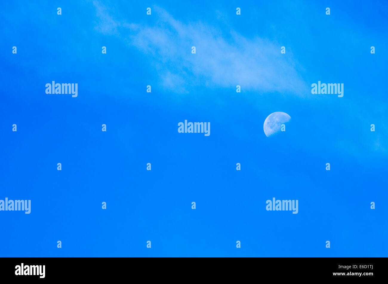 Half moon in daylight Stock Photo - Alamy