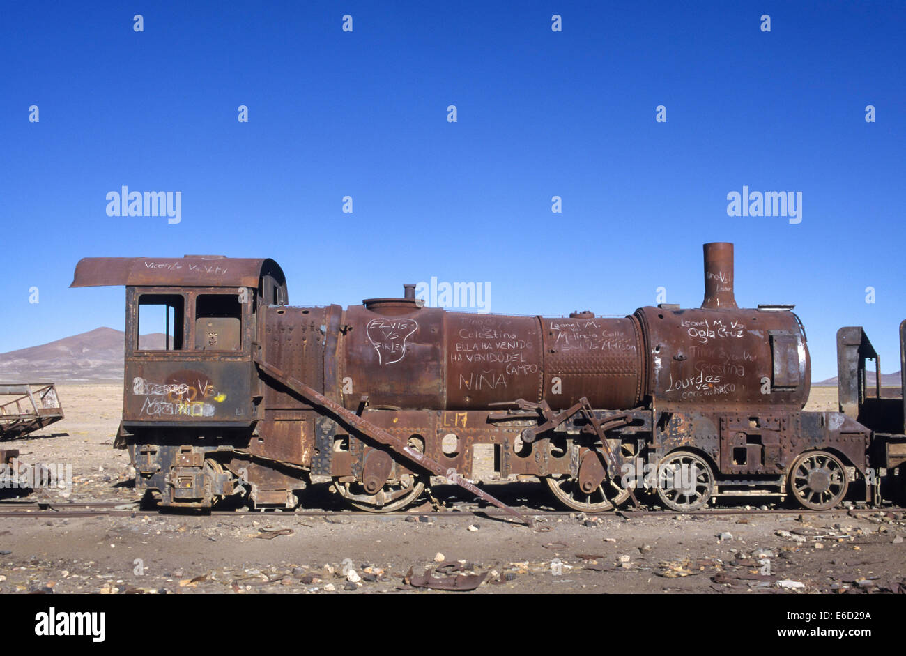 Rusty locomotive, train cemetery in the middle of the altiplano desert ...