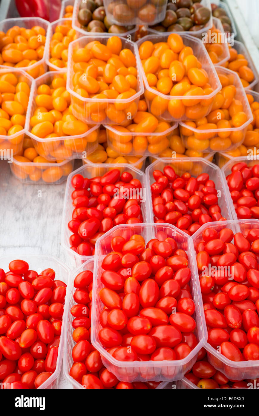 Assorted cherry tomatoes on display on a street market stall Stock ...