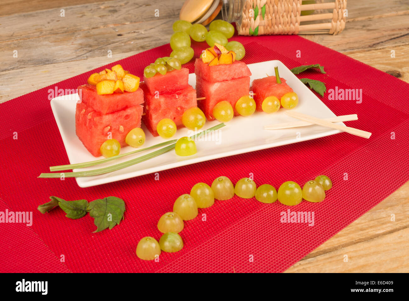 Fruity watermelon train, a creative dessert for kids Stock Photo - Alamy