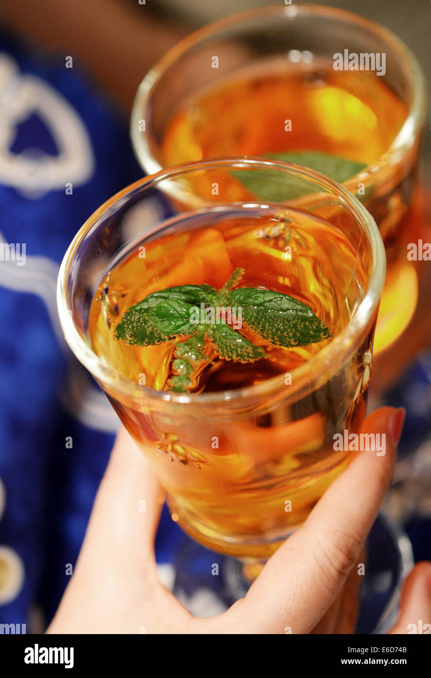 A glas of aperal spritzer with a mint leaf is on display in Berlin ...