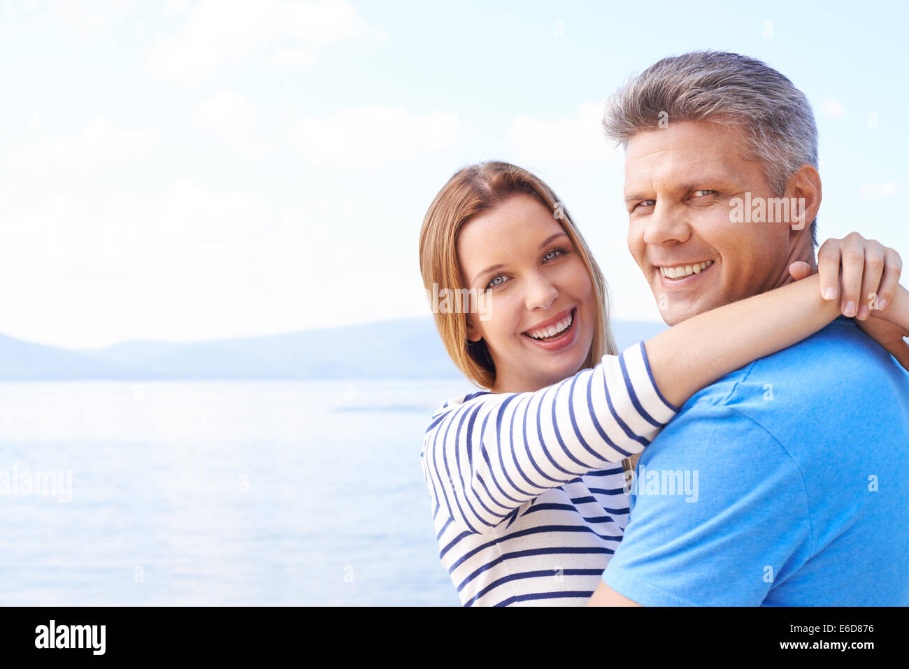 Couple having good time on the sea Stock Photo - Alamy