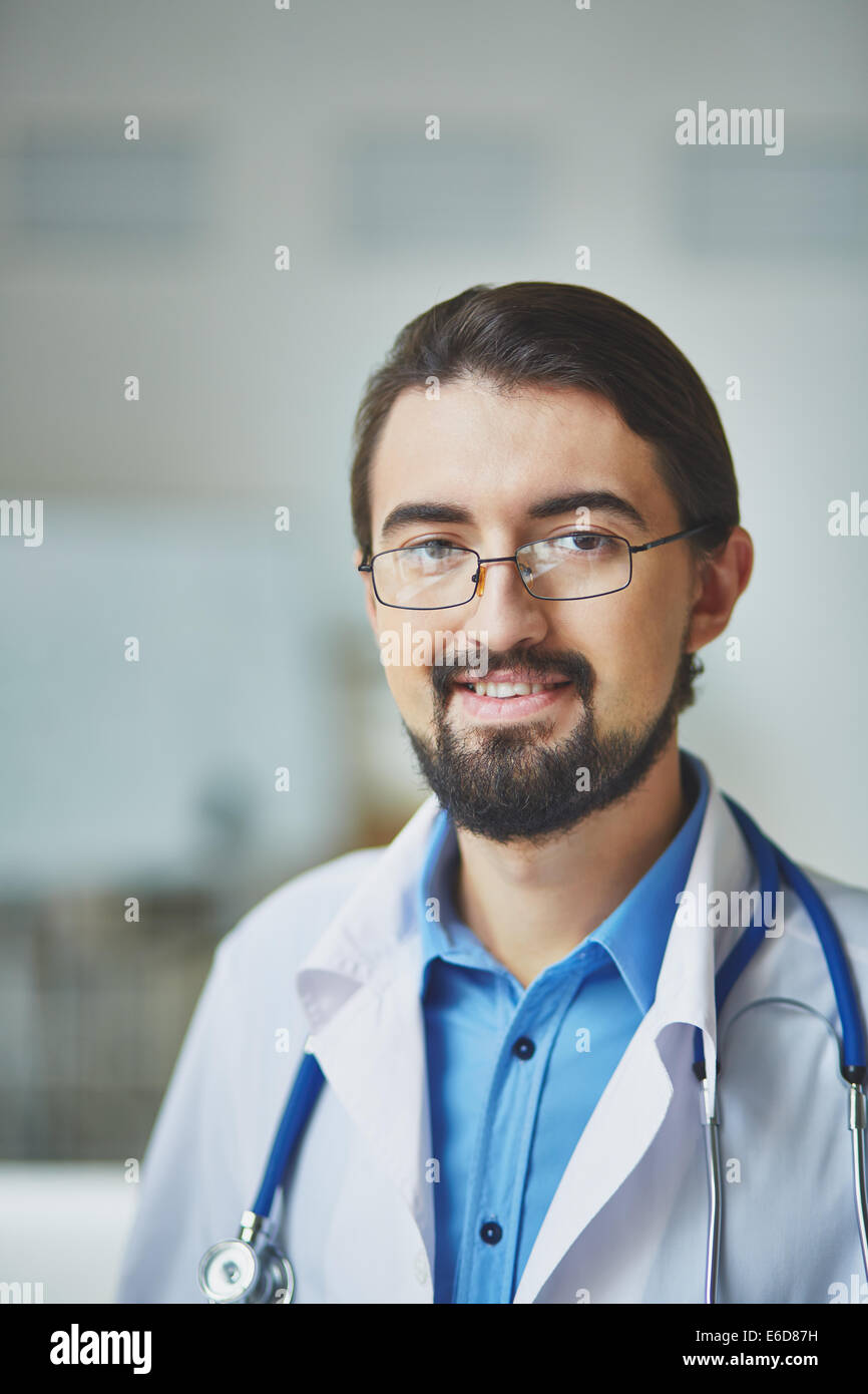 Portrait smiling male doctor gp hi-res stock photography and images - Alamy