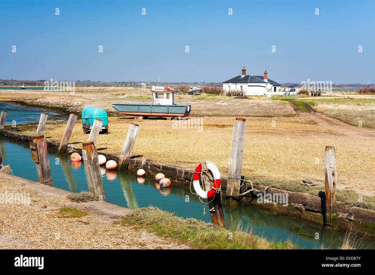 Quay at Hurst Spit with the 1867 Hurst Point Lighthouse near Milford-on ...