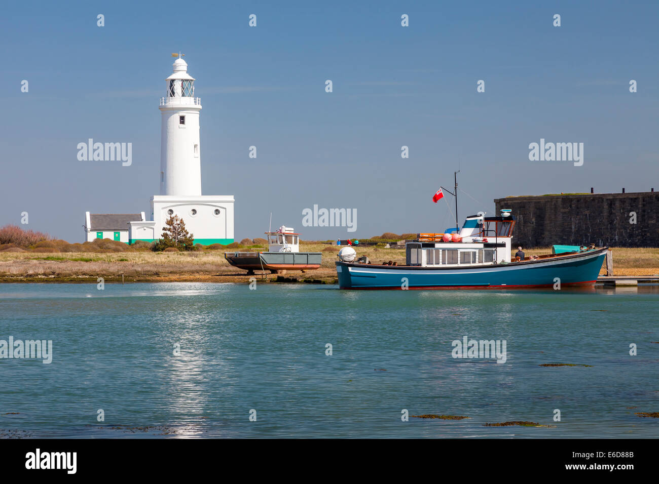 Quay at Hurst Spit with the 1867 Hurst Point Lighthouse near Milford-on ...