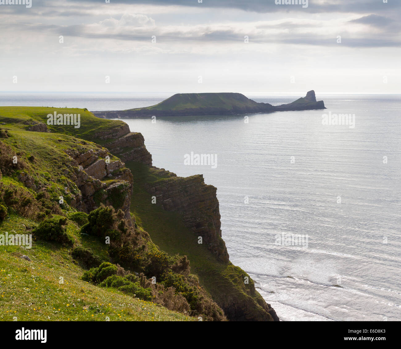 Views across Rhossili Bay to the Worms Head Headland, Wales UK Europe ...