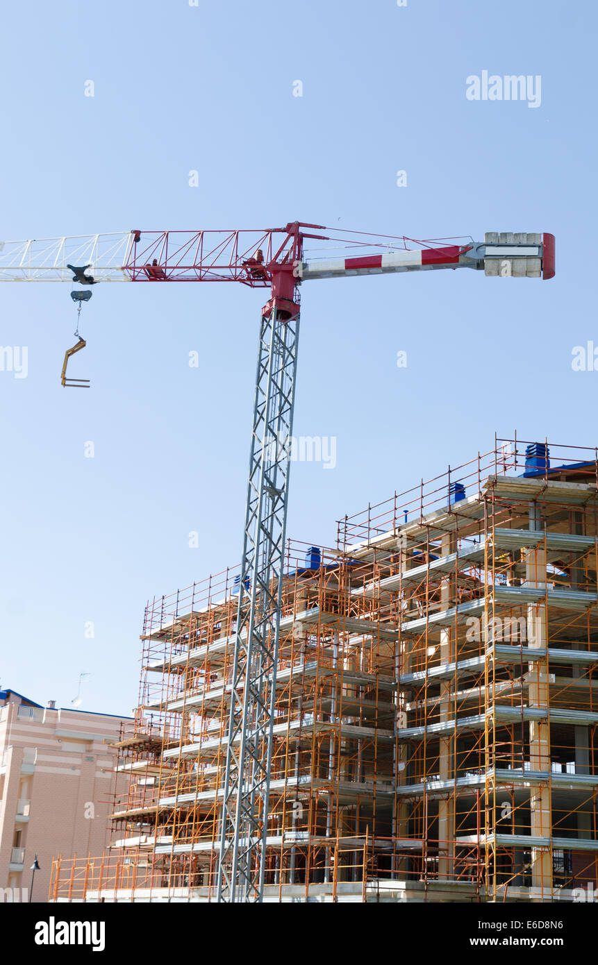 House exterior in construction and crane Stock Photo - Alamy