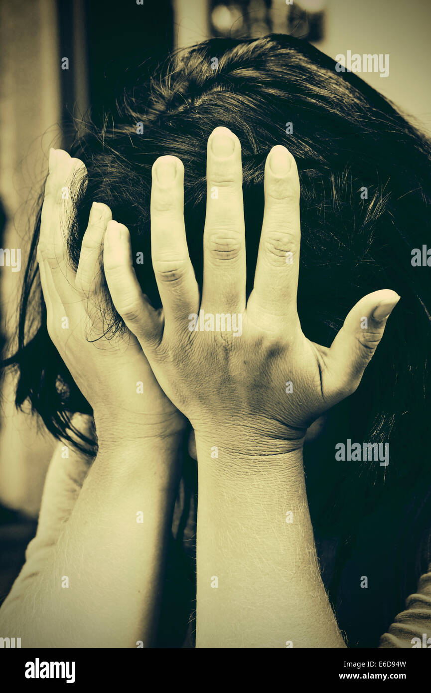 Despairing young woman Stock Photo - Alamy