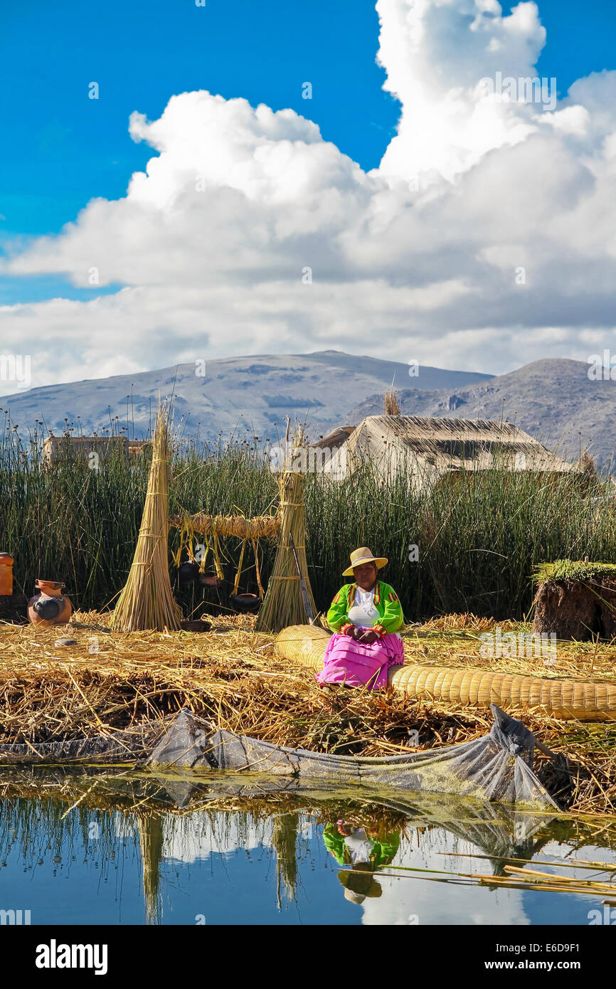 South America, Peru, Uru woman, Floating island of the Lake Titicaca ...