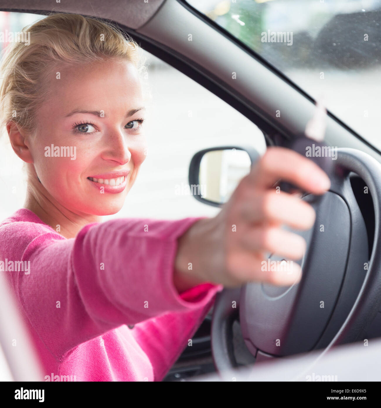 Woman driver showing car keys Stock Photo - Alamy