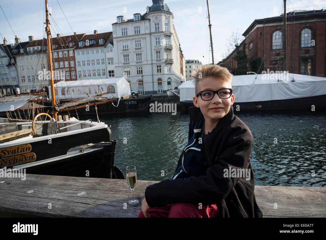 Denmark, Copgenhagen, Nyhavn, Young boy Stock Photo - Alamy