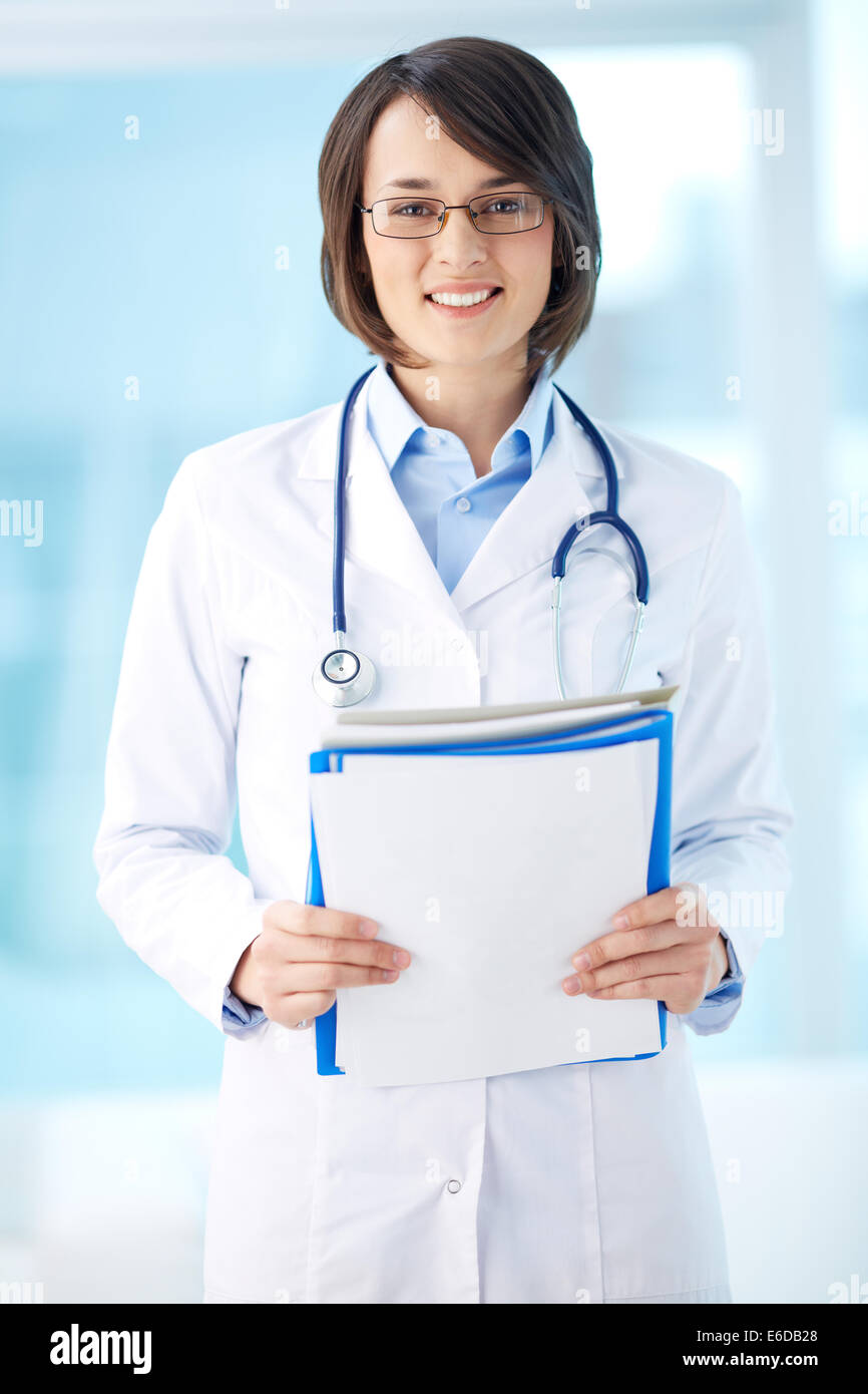 Portrait young doctor documents hi-res stock photography and images - Alamy