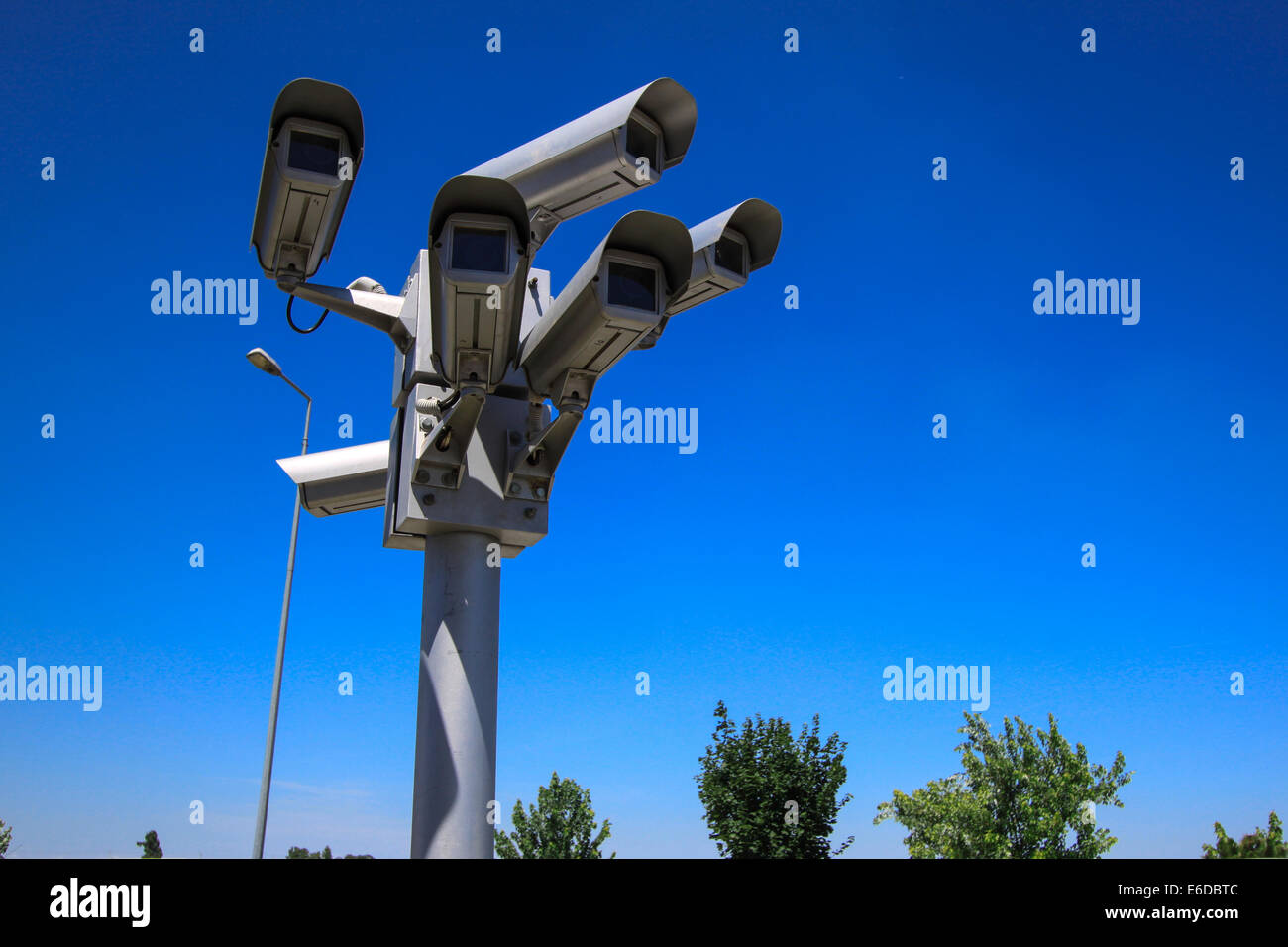 Six cctv cameras on a post Stock Photo - Alamy