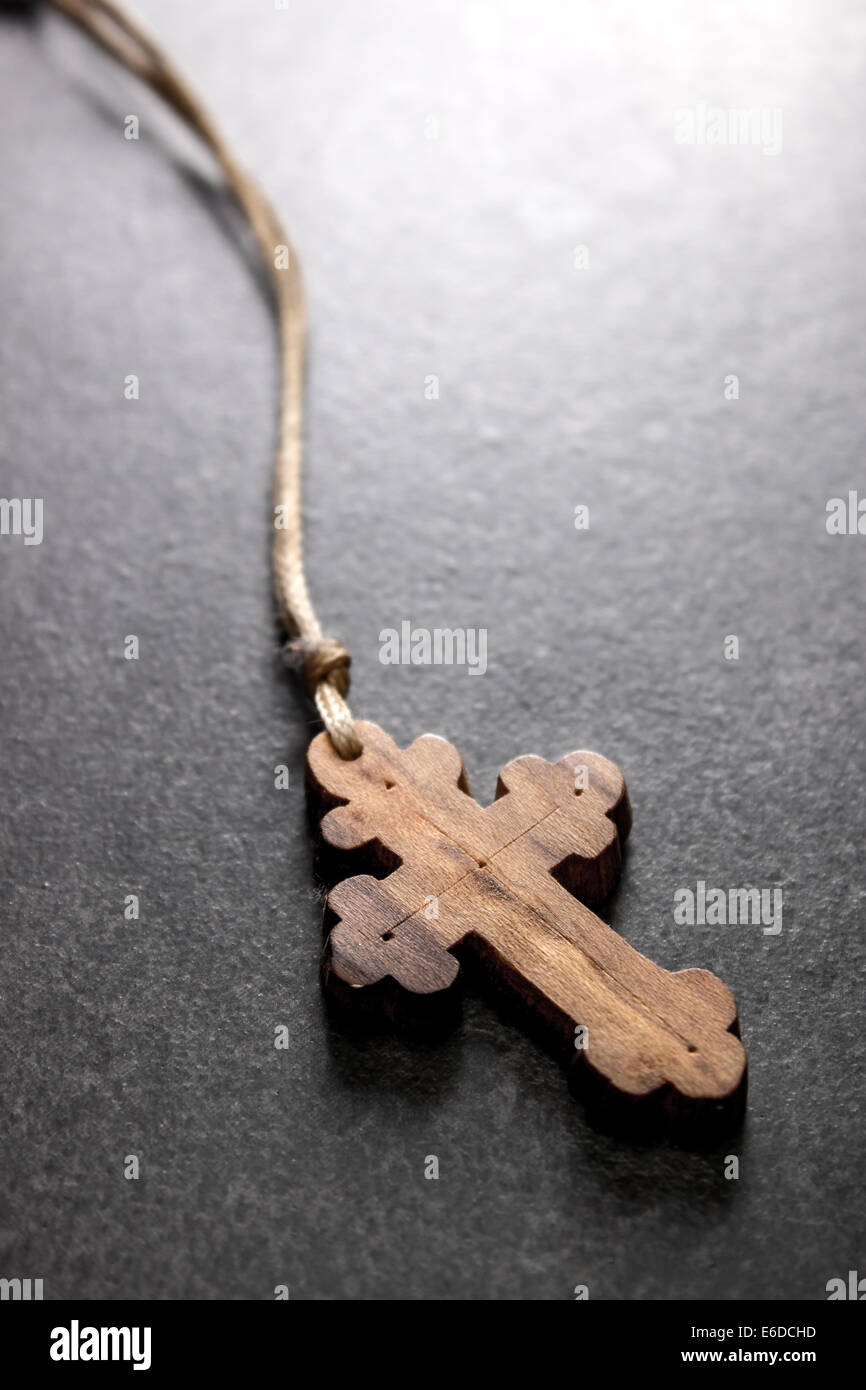 wooden cross on table, close up photo Stock Photo - Alamy