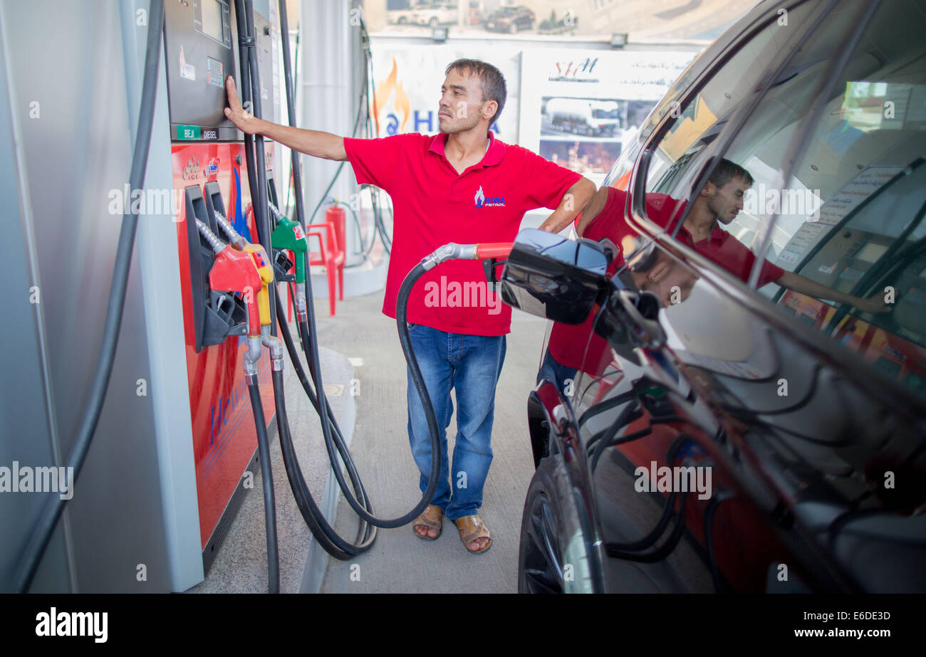 Filling station attendant hi-res stock photography and images - Alamy