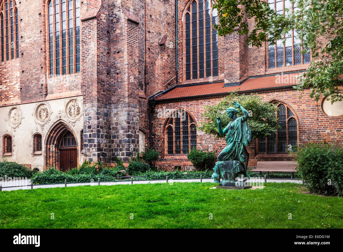 Bronze statue of Klio or Clio, the Muse of History, in front of the ...