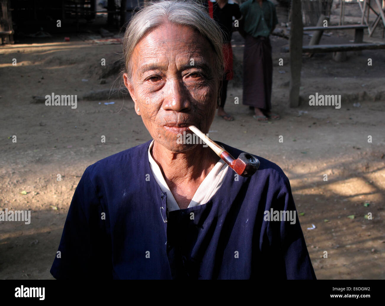 Spider woman of Burma, Old tradition in remote river village.Smoking ...