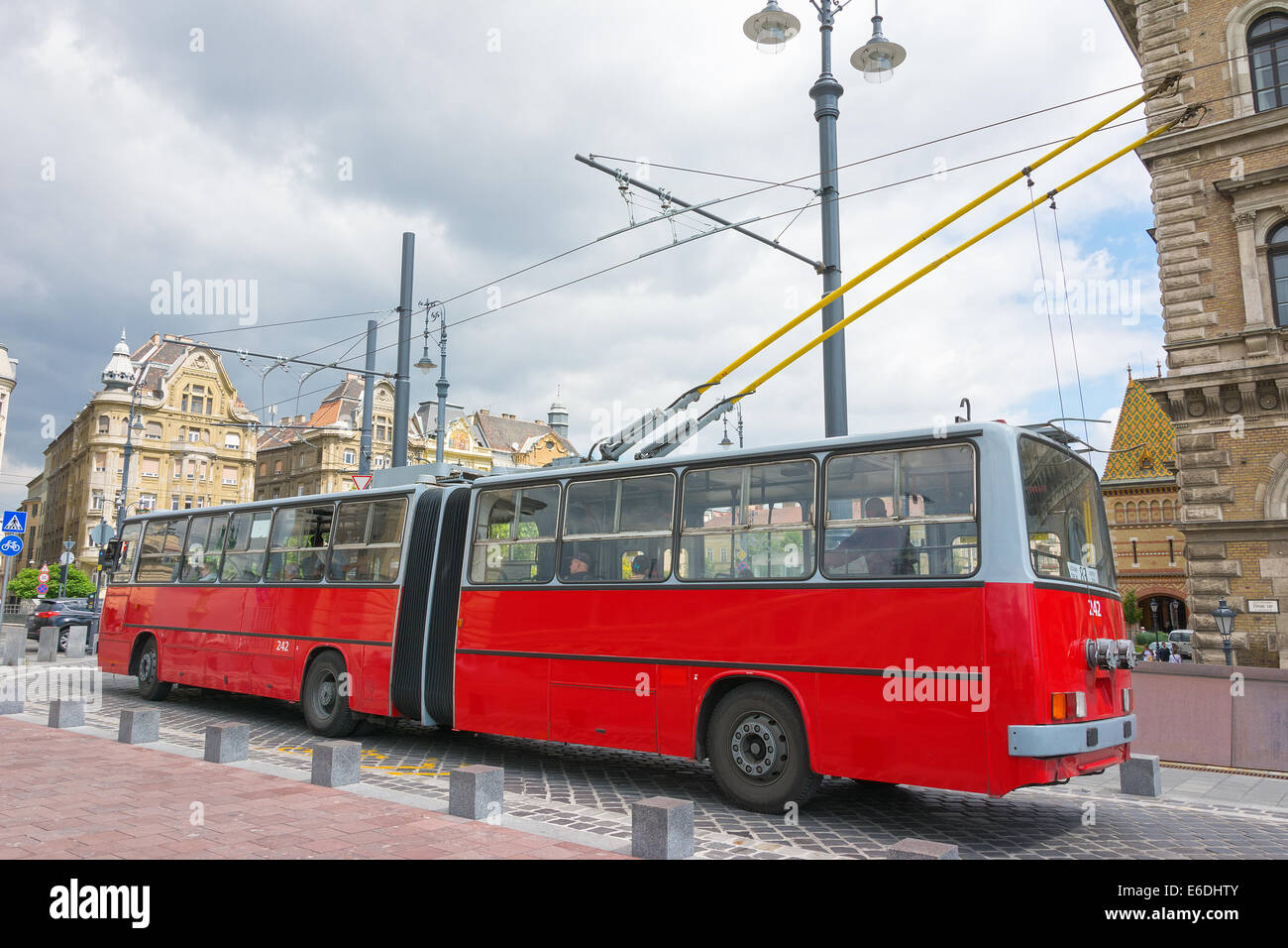 Red trolleybus in Budapest Stock Photo - Alamy
