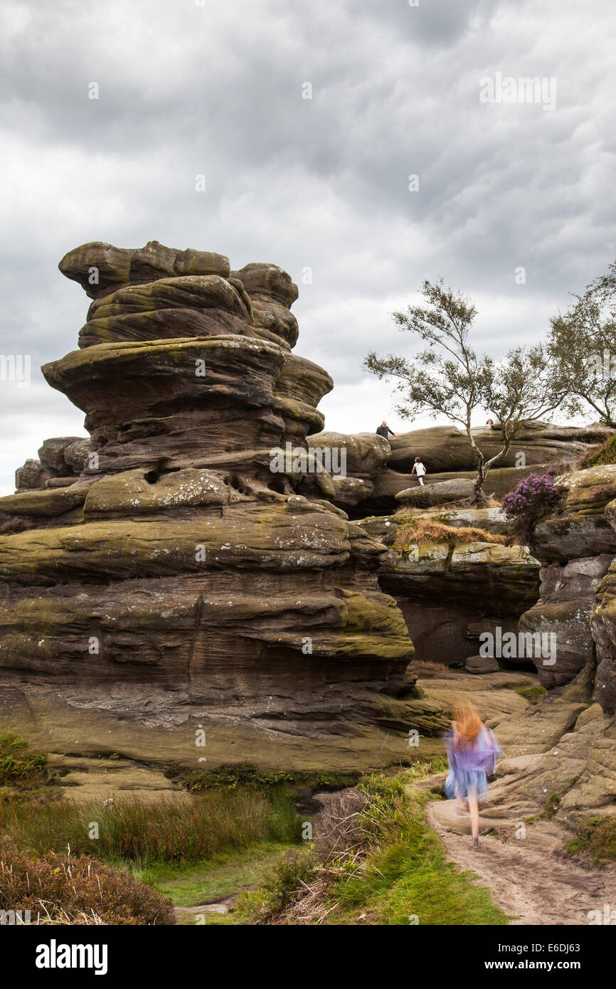 People at Brimham Rocks; Brimham Crags a collection of balancing ...