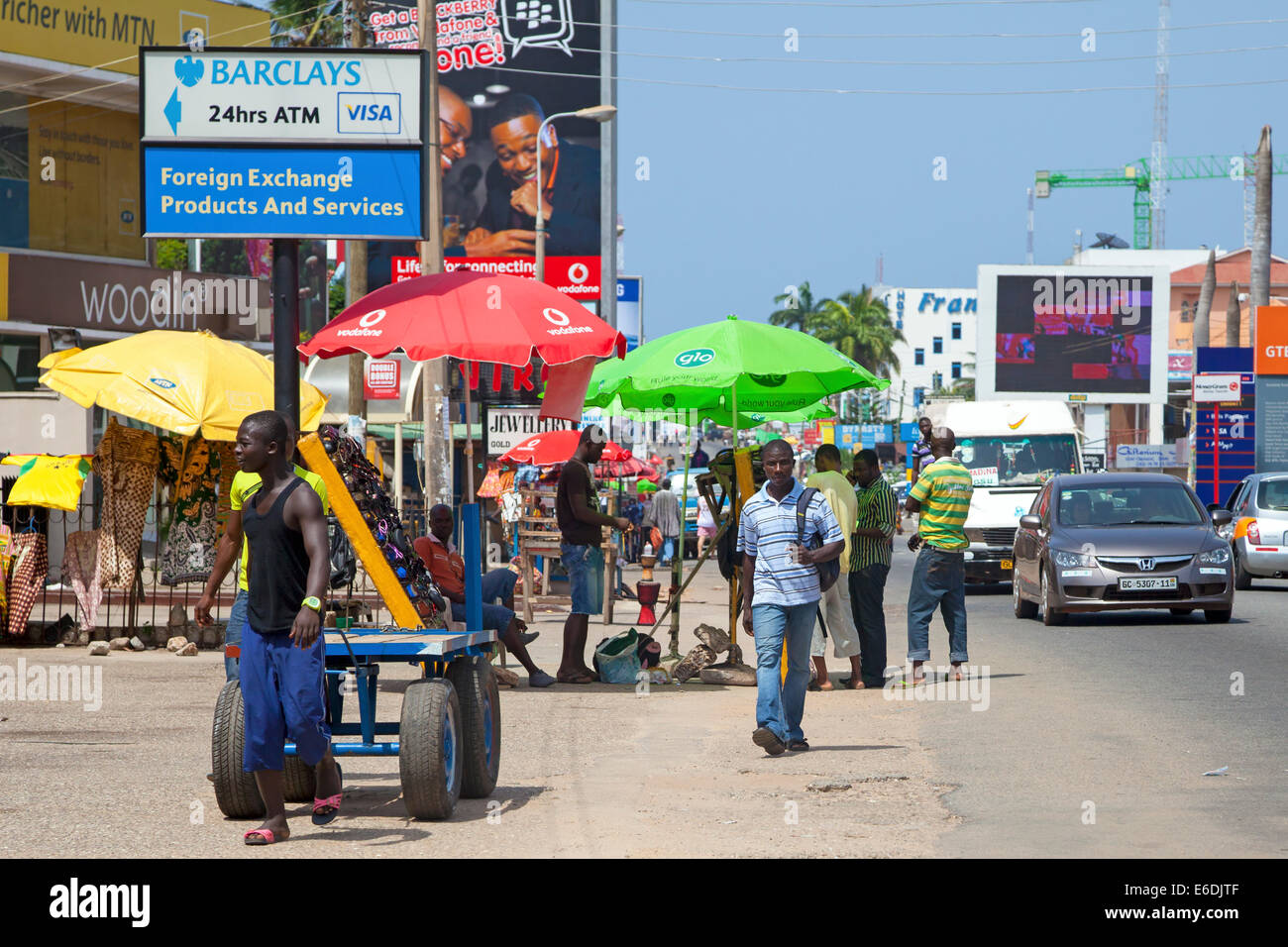 Pedestrians and traffic on Oxford Street, Osu, Accra, Ghana, Africa ...