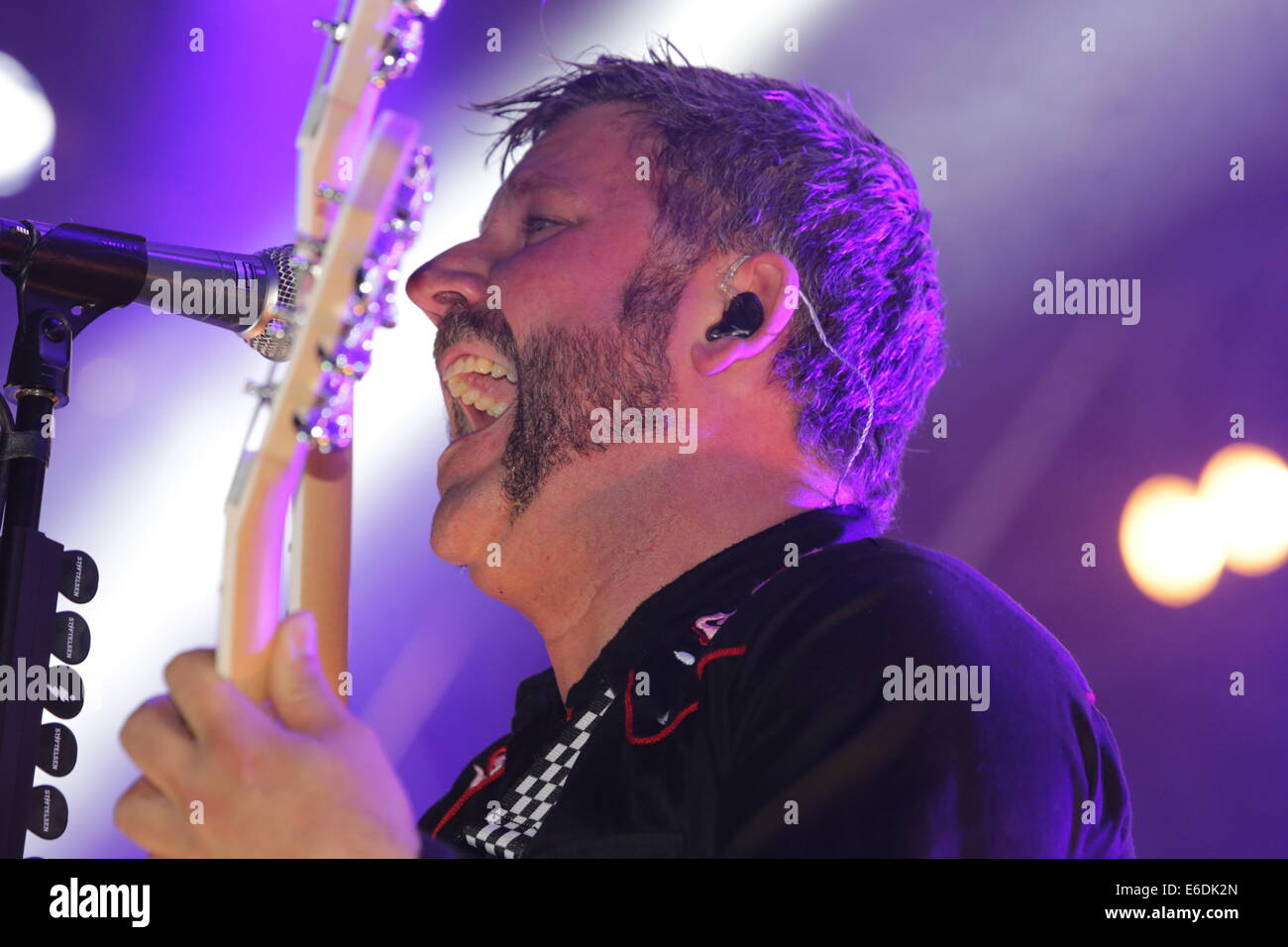 Band playing live at a concert Stock Photo - Alamy
